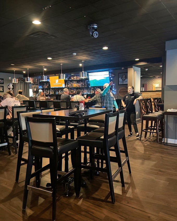 Where strangers become neighbors and neighbors become friends. The high-top tables practically invite you to stay "just one more hour."