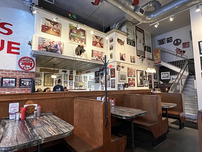 Walls adorned with decades of memories and memorabilia. It's not decoration—it's a barbecue history museum where you can eat the exhibits. 
