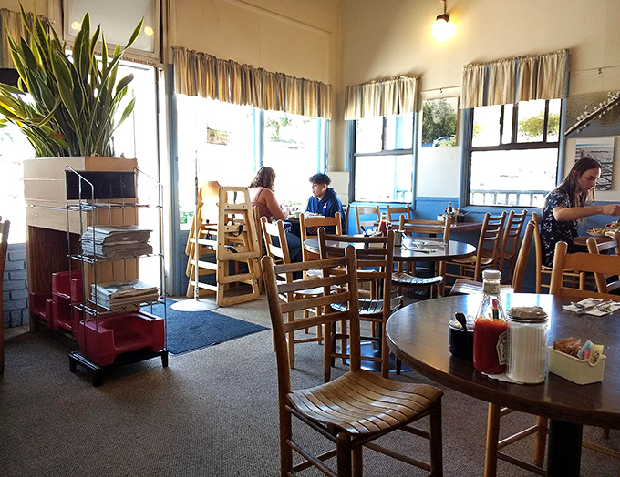 Sunlight streams through windows as conversations flow. Linda's dining room balances cozy charm with enough space to enjoy your breakfast without wearing your neighbor's.