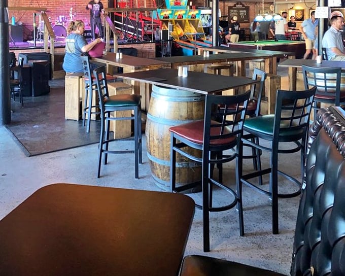 Barrel tables and comfortable seating say "stay awhile" – this isn't fast food, it's food worth savoring with friends.