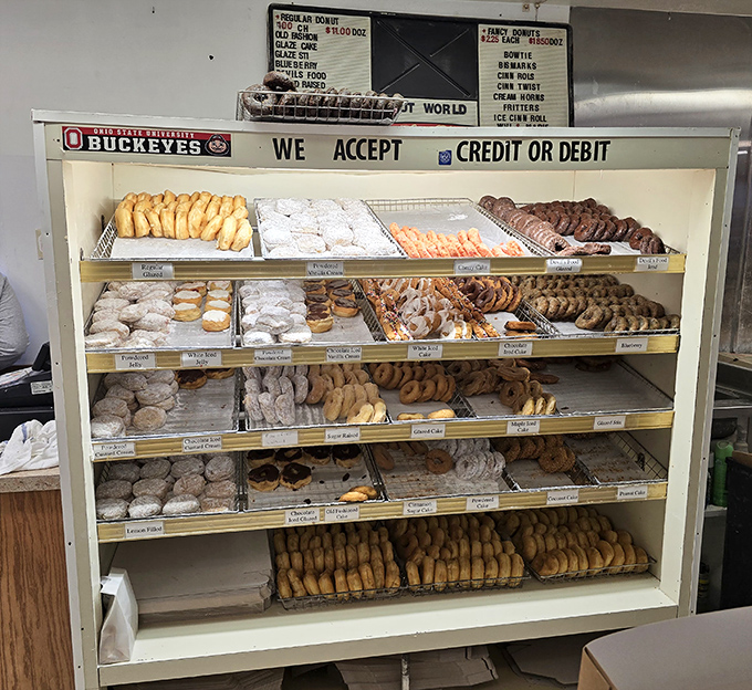 The donut display stands at attention, ready to report for duty in your stomach – what dedication!