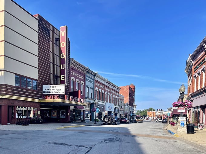 The Vogue Theatre's classic marquee lights up downtown, proving that some entertainment experiences simply can't be replicated on a smartphone.