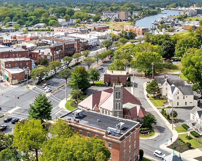 This aerial view showcases downtown Salisbury's historic church spires and tree-lined streets—Norman Rockwell would've needed more paint to capture it all.