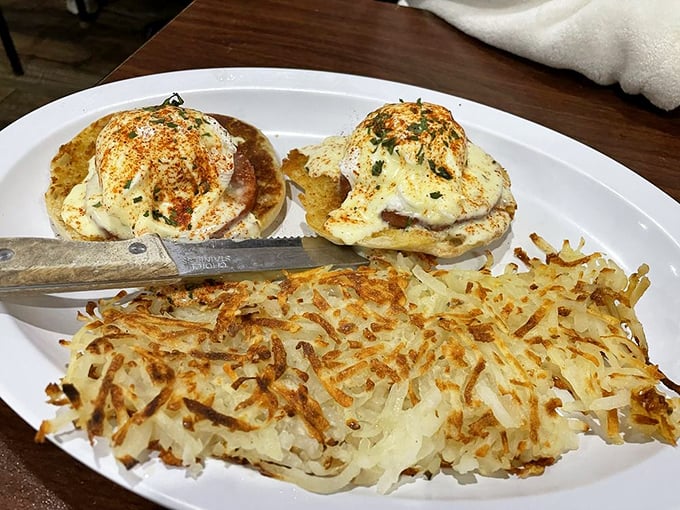 Eggs Benedict reimagined with a Southern drawl—perfectly poached eggs perched atop English muffins like tiny breakfast thrones. The hollandaise speaks volumes.