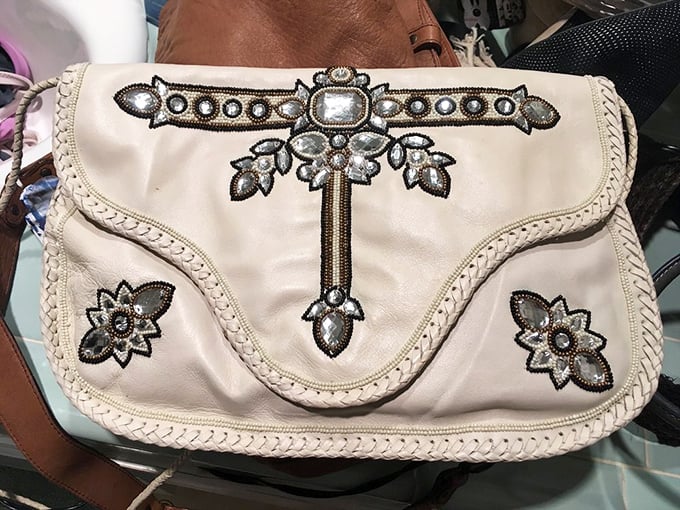 This vintage clutch has probably held more prop money than real cash – but the style is priceless.