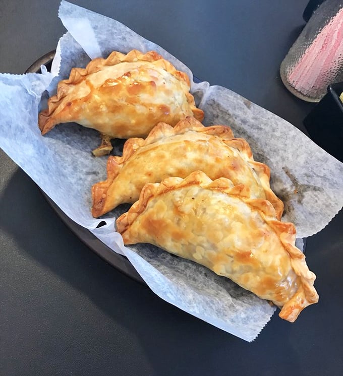 Golden-brown empanadas with perfectly crimped edges—like little treasure chests filled with savory fillings instead of gold doubloons. Actually, I prefer these.