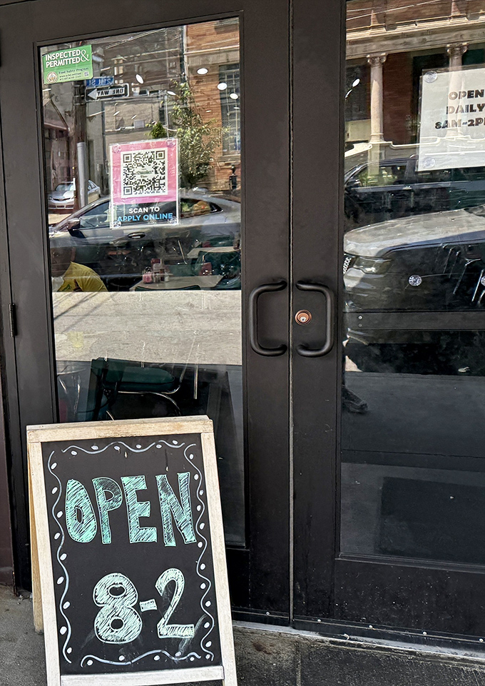 The chalkboard doesn't lie—8-2 are the magic hours when breakfast dreams come true and weekend warriors line up for their reward.