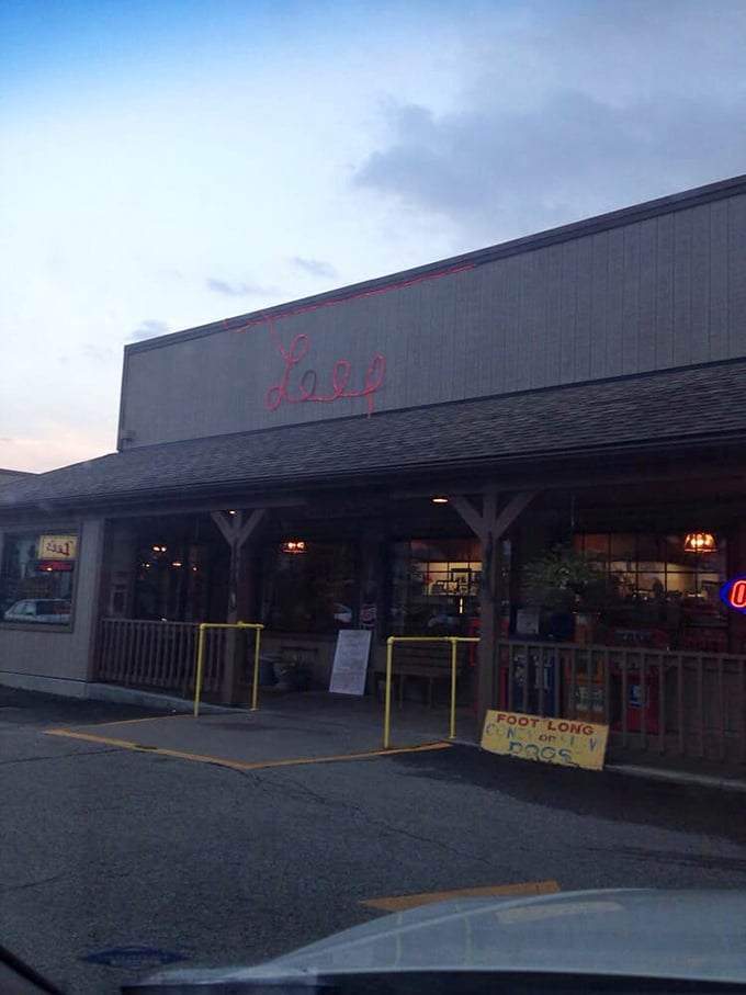 As dusk settles, the neon "Lee's" sign becomes a beacon for hungry travelers. Like a lighthouse guiding ships to safe harbor—if ships craved comfort food.