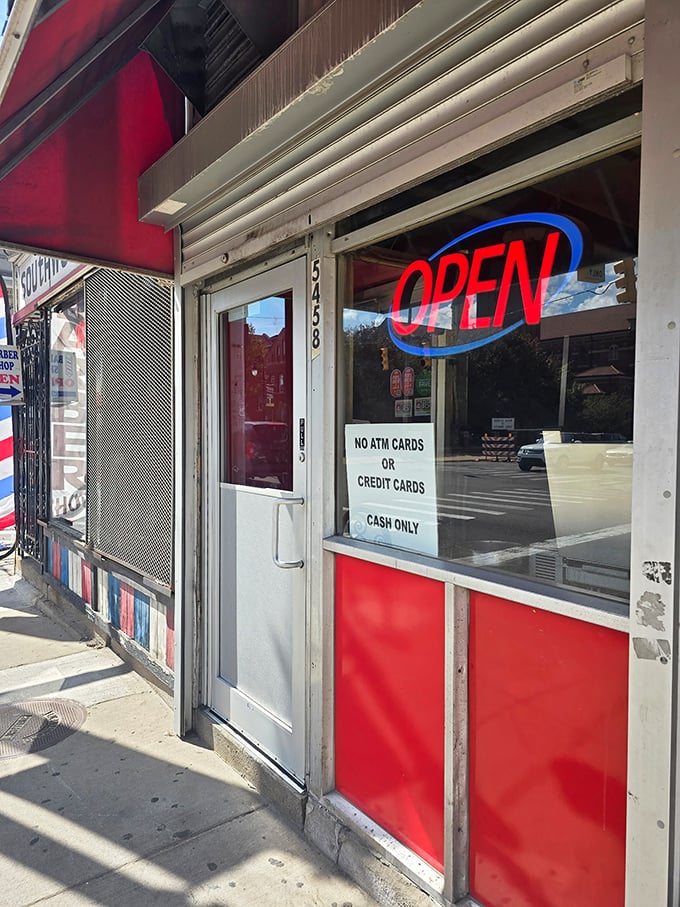 The entrance says it all—"OPEN" in neon and "CASH ONLY" in no-nonsense lettering. Some traditions are worth preserving.