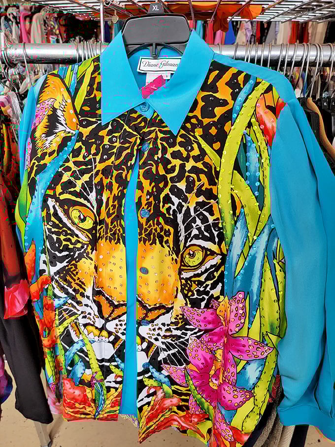 This vibrant tiger-print blouse screams "confidence"—the kind of statement piece that transforms Monday meetings into runway moments.
