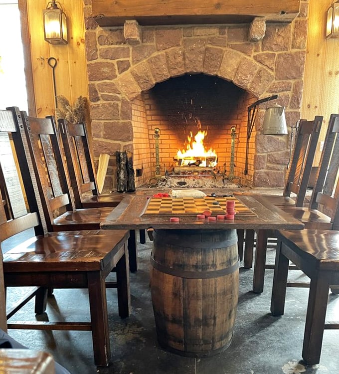 That fireplace isn't just for show – it's warming souls and checkerboard battles alike. Comfort food deserves a comfortable setting.