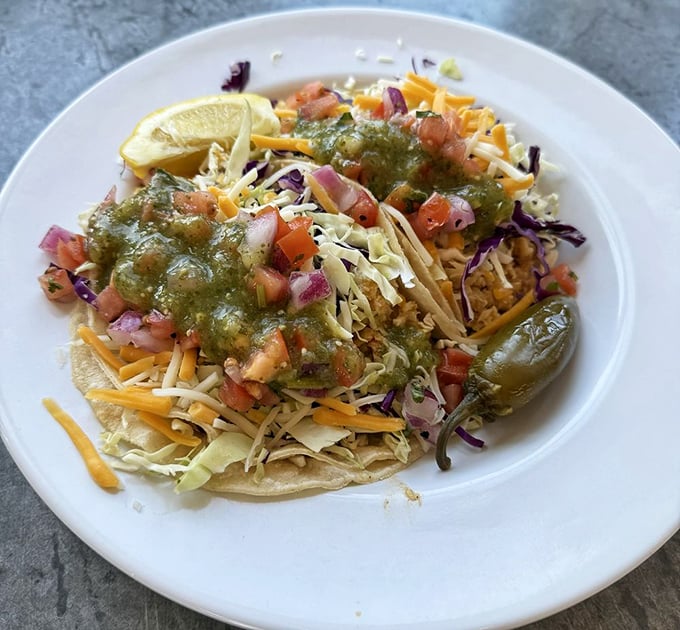 Fish tacos that make you question why you'd ever eat anything else—fresh, vibrant, and requiring both hands and several napkins.