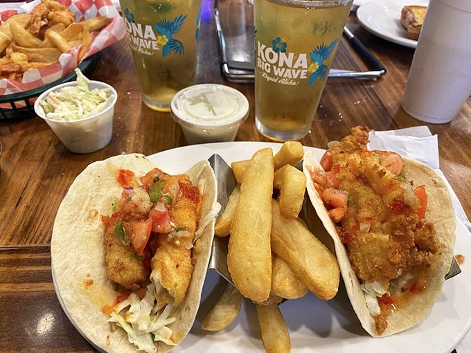 Fish tacos that tell a story of the Gulf – crispy, fresh, and vibrant. The kind of casual masterpiece that makes you question all other tacos you've ever known.