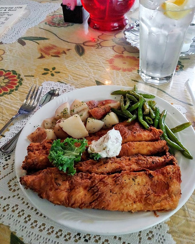 Fish so perfectly cooked it makes you wonder if there's a mermaid in the kitchen. Those green beans and potatoes aren't just sides—they're supporting actors deserving their own awards.