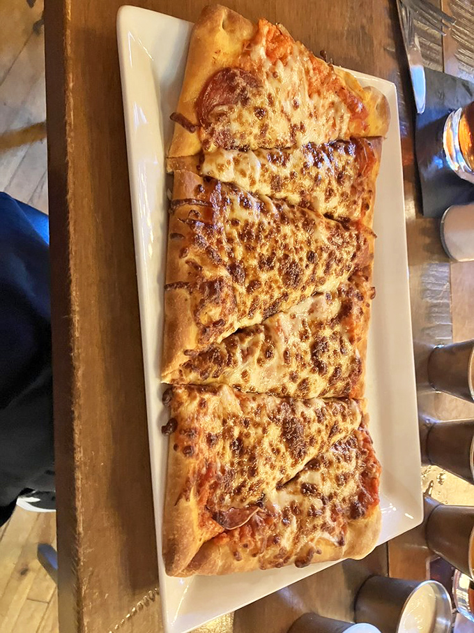 This flatbread isn't just a pizza's sophisticated cousin—it's a crispy, cheesy canvas of flavor that demands to be shared. Or not. No judgment here.