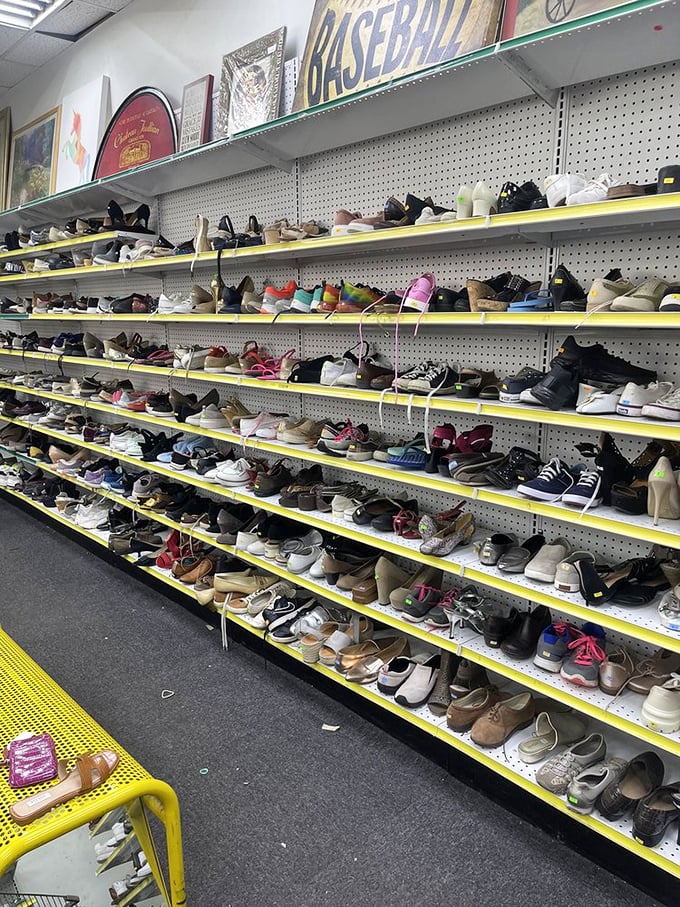 Shoe heaven or footwear purgatory? Hundreds of soles waiting for their perfect match in this oddly mesmerizing display of secondhand steps.