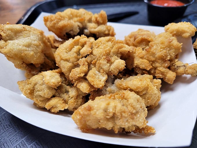 Delicate oysters encased in crunchy armor—ocean treasures that have found their perfect final form in an Ohio kitchen.