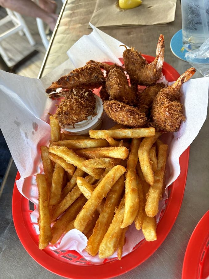 Coconut shrimp that crunch like a satisfying beach day – golden, crispy, and making you wonder why you'd eat shrimp any other way.