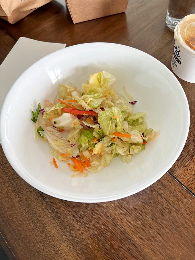 This isn't just a side salad—it's the supporting actor that deserves its own award. Fresh, crisp, and ready to balance all that chowdery richness.