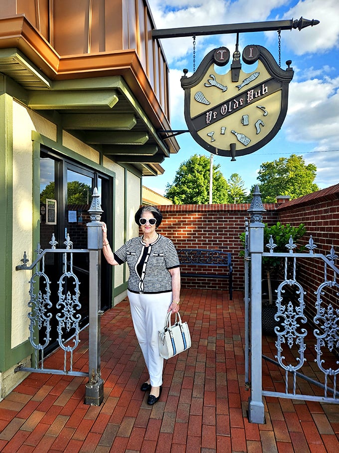 The entrance to Ye Olde Pub section welcomes guests through ornate ironwork gates—like passing through a portal to cocktail paradise.