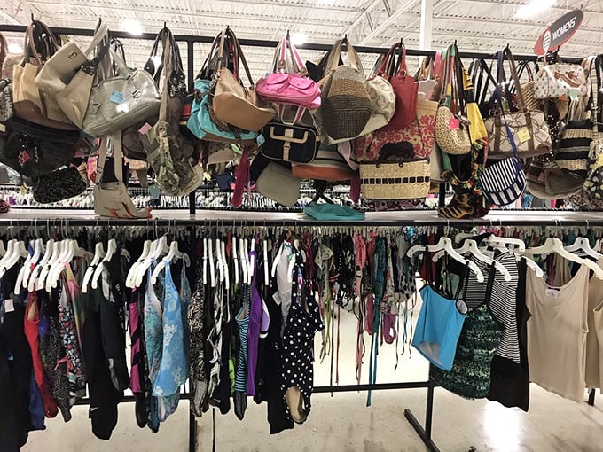 Handbag heaven hovers above a sea of tops—where designer knockoffs and genuine finds hang together in fashionable democracy.