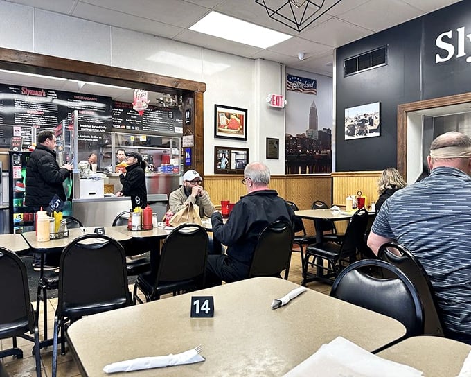 Where the magic happens. The open kitchen design isn't about theatrics—it's about watching sandwich artists practice their craft with decades of experience.