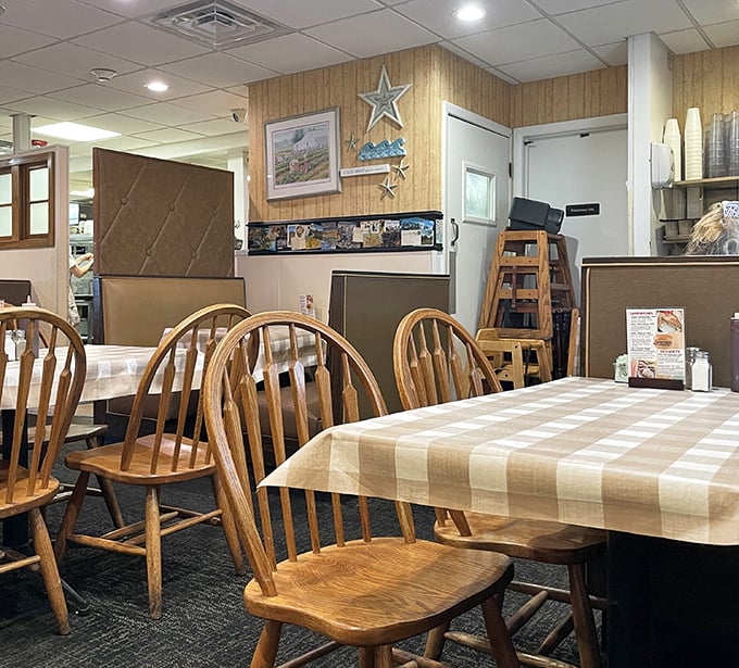 Simple wooden chairs that have witnessed countless "Oh my goodness" moments—silent observers to generations of food-induced happiness.