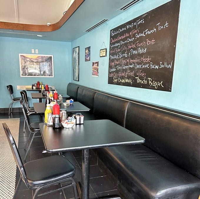 Turquoise walls and a chalkboard menu of daily specials—visual proof that this place understands the comfort food assignment.