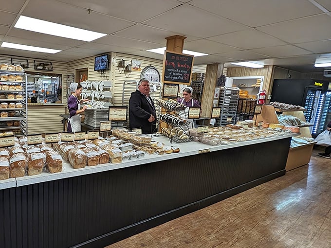 The bread counter stretches on like a delicious horizon – where every loaf has a purpose and none involve sandwich mediocrity.