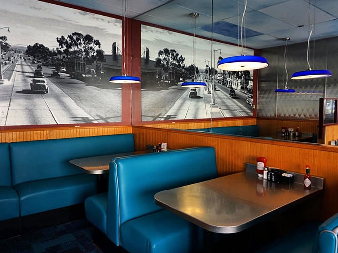 Those booths have that perfect vintage diner blue that says "comfort food lives here" in upholstery language.
