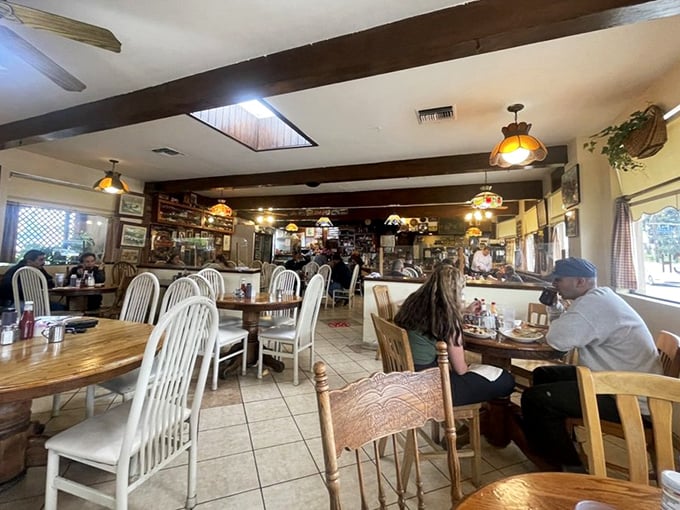 Dark wood beams and collected memories – this dining room has more stories than a library.