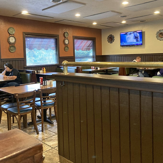 Another view of comfort – where every table has witnessed countless conversations over generous portions.