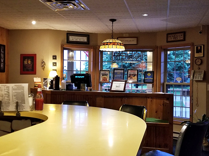 Classic diner booths invite you to settle in for the long haul – these aren't meals you rush through, they're experiences to be savored.