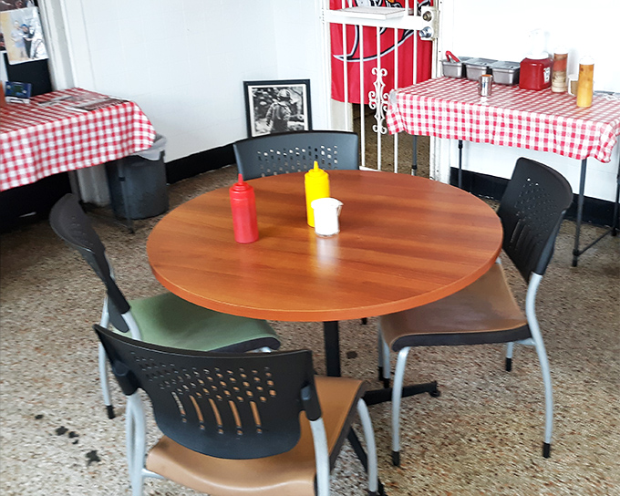 Red checkered tablecloths and simple condiments – because when the food is this good, you don't need fancy table settings to impress.