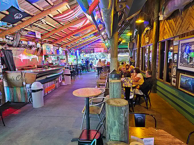 The tiki bar vibes are strong here, like Jimmy Buffett designed a seafood restaurant in the best possible way.