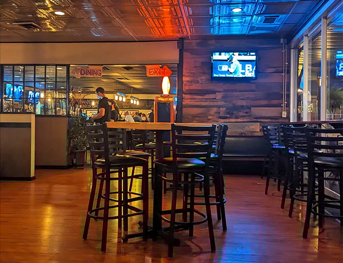 High-top tables await the after-work crowd. The neon "EXIT" sign isn't fooling anyone—once you're here, you won't want to leave.