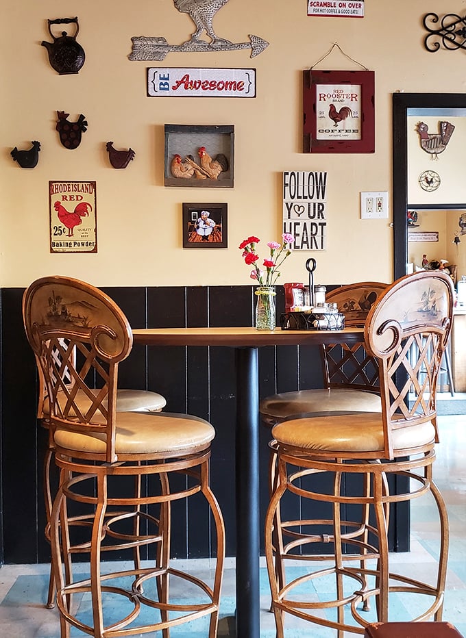 Every inch of wall space tells a story – from roosters to inspirational quotes, it's like your favorite aunt's kitchen but with better food.