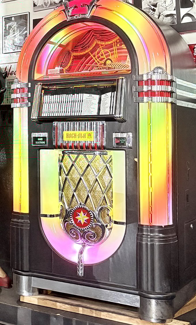 This isn't just a jukebox—it's a time portal glowing with neon nostalgia, ready to soundtrack your breakfast adventure with hits from yesteryear.