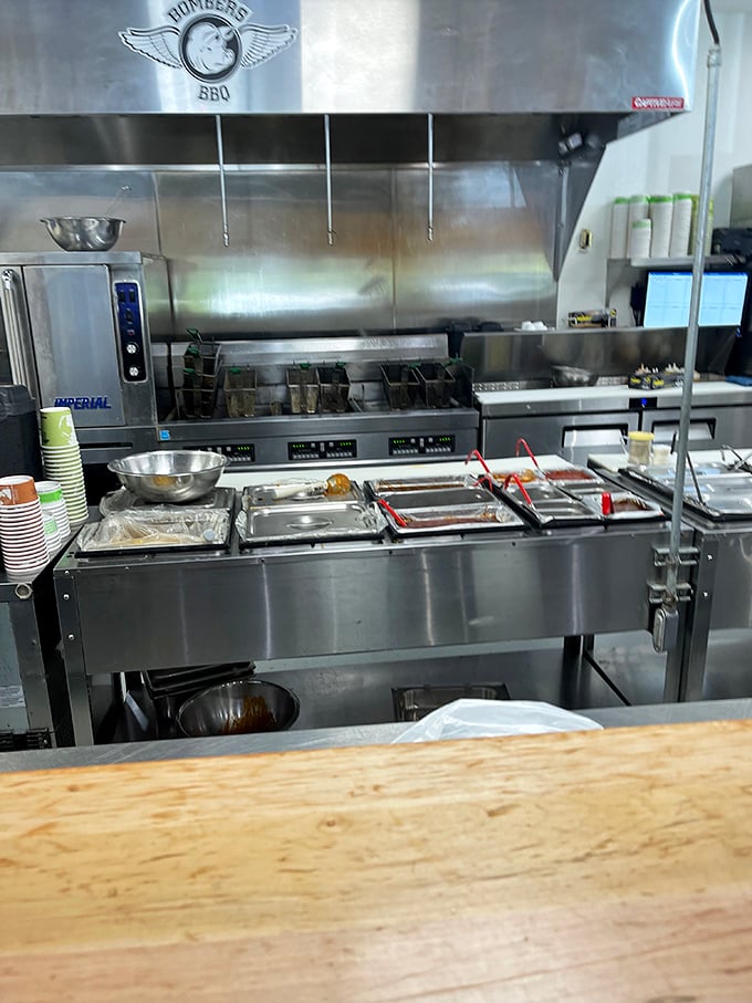 A glimpse into the kitchen reveals the gleaming arsenal where barbecue magic happens – stainless steel warriors ready for the day's delicious battle.