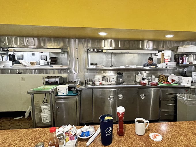 Behind the scenes, the kitchen gleams with well-used efficiency. This is where breakfast dreams are built, one omelet at a time. 