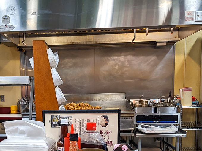 Behind the scenes magic happens here—where spatulas dance and griddles sizzle in the choreographed ballet of breakfast preparation.