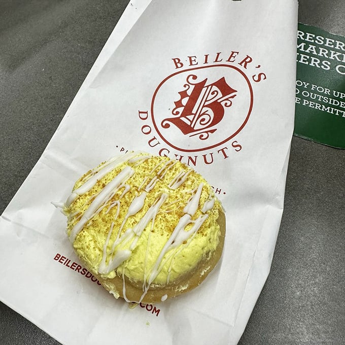 Sunshine captured in donut form. This lemon creation delivers brightness in every bite, proving that happiness is, indeed, hand-held.