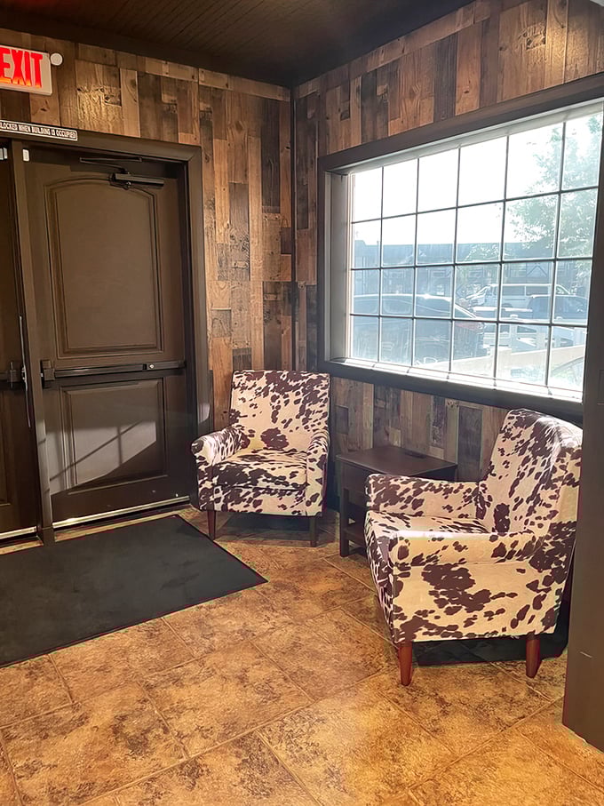 Cowhide chairs and reclaimed wood walls—this waiting area isn't just rustic, it's a preview of the authenticity awaiting your taste buds.