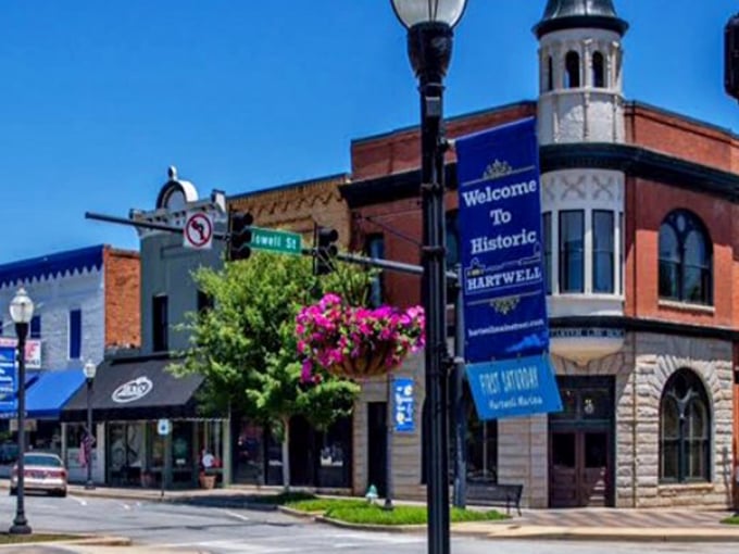 Historic downtown wears its "Welcome to Hartwell" banner like a friendly neighbor waving from the porch.