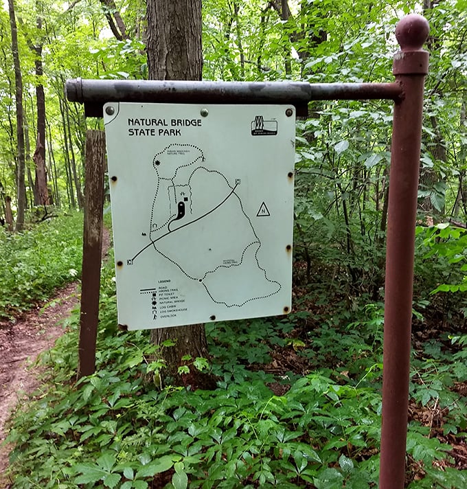 "You are here" – at the crossroads of geological wonder. This weathered trail map has guided countless explorers to Wisconsin's natural marvel.