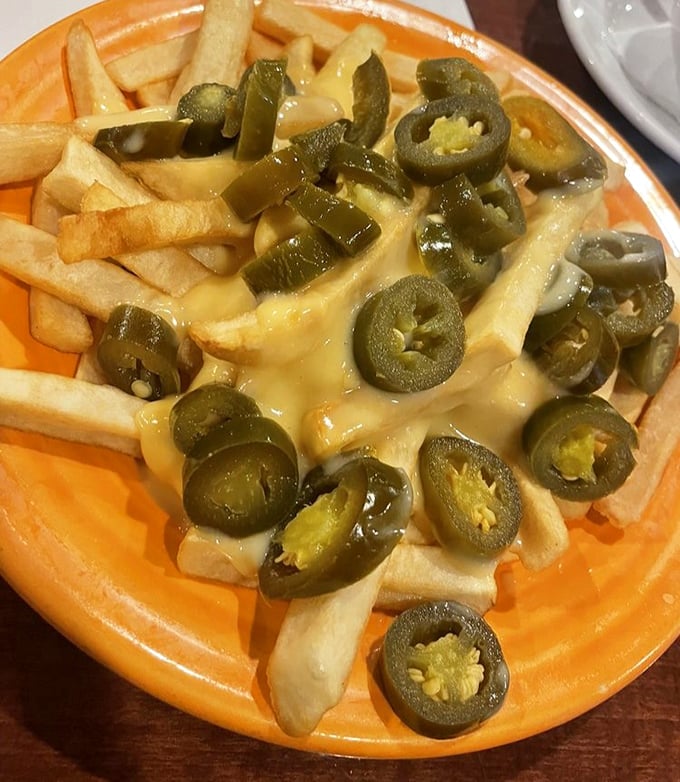 Jalapeño cheese fries that deliver that perfect one-two punch of creamy cheese and spicy peppers – resistance is futile.