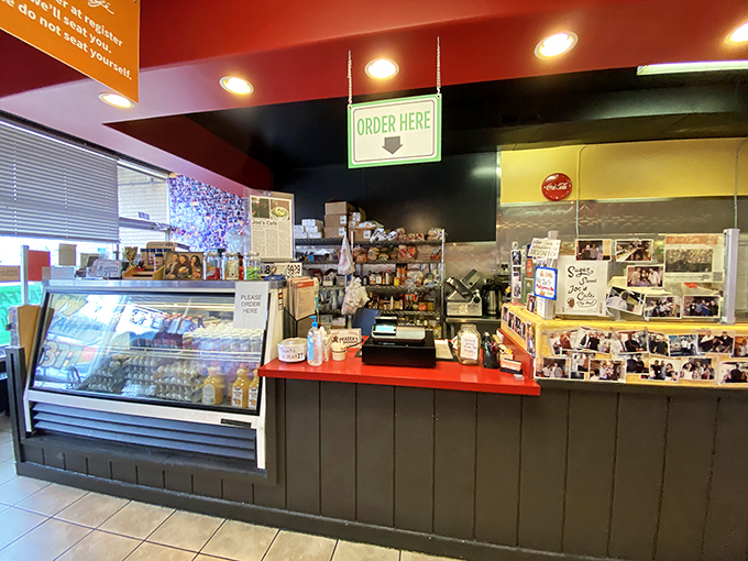 Where breakfast dreams begin: the ordering counter at Joe's Cafe, where "yes" is the correct answer to "Would you like more coffee?"