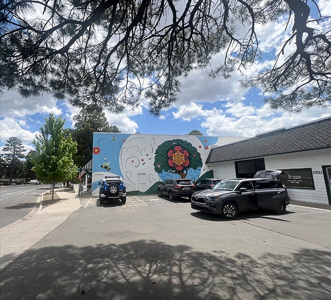 Another angle of the eye-catching mural that makes Cedar Closet impossible to miss—like a desert mirage, except the treasures inside are very real.