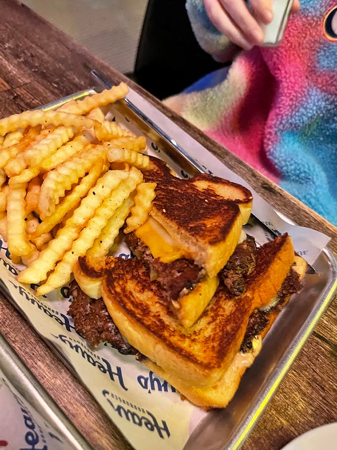 The patty melt—burger's sophisticated cousin who went to finishing school. Grilled bread, melty cheese, and beef create the holy trinity of sandwich perfection.