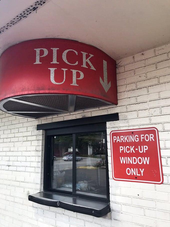 The pick-up window: where locals in the know grab their Tom Jones favorites without leaving the comfort of their cars.